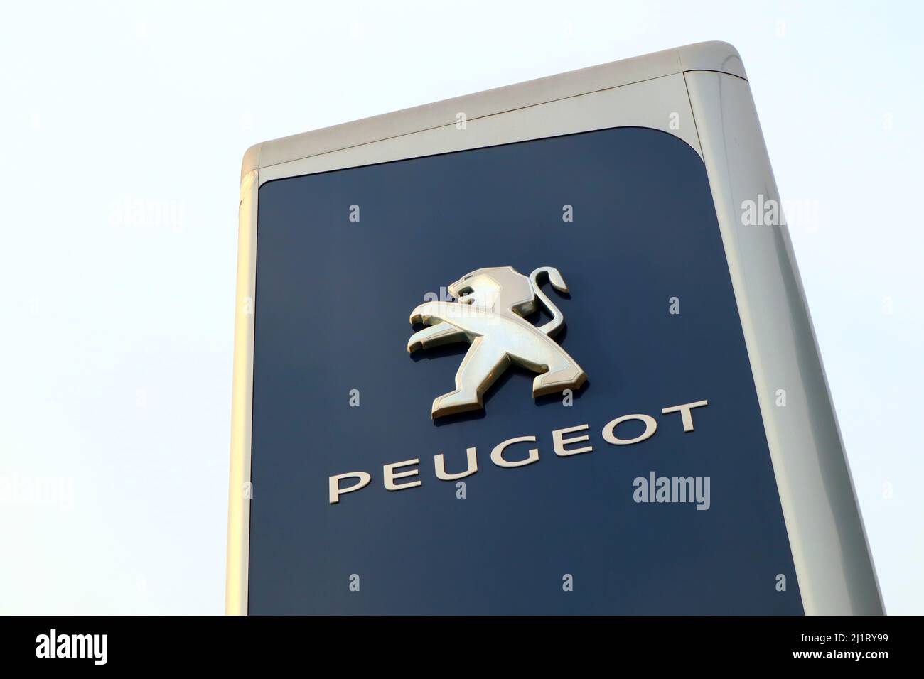 PEUGEOT dealer sign. Peugeot is a French automobile manufacturer Stock ...