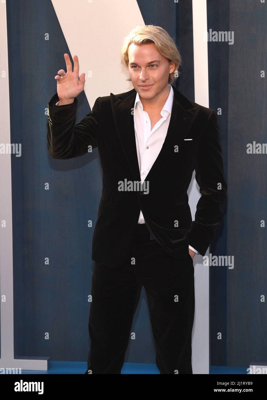 Ronan Farrow walking on the red carpet at the 2022 Vanity Fair Oscar ...