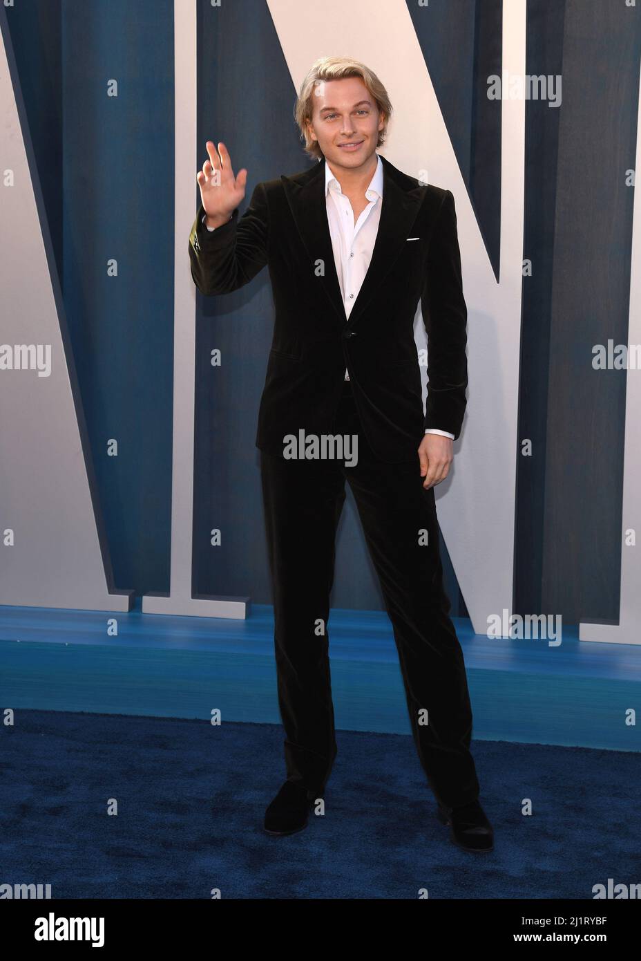 Ronan Farrow walking on the red carpet at the 2022 Vanity Fair Oscar ...