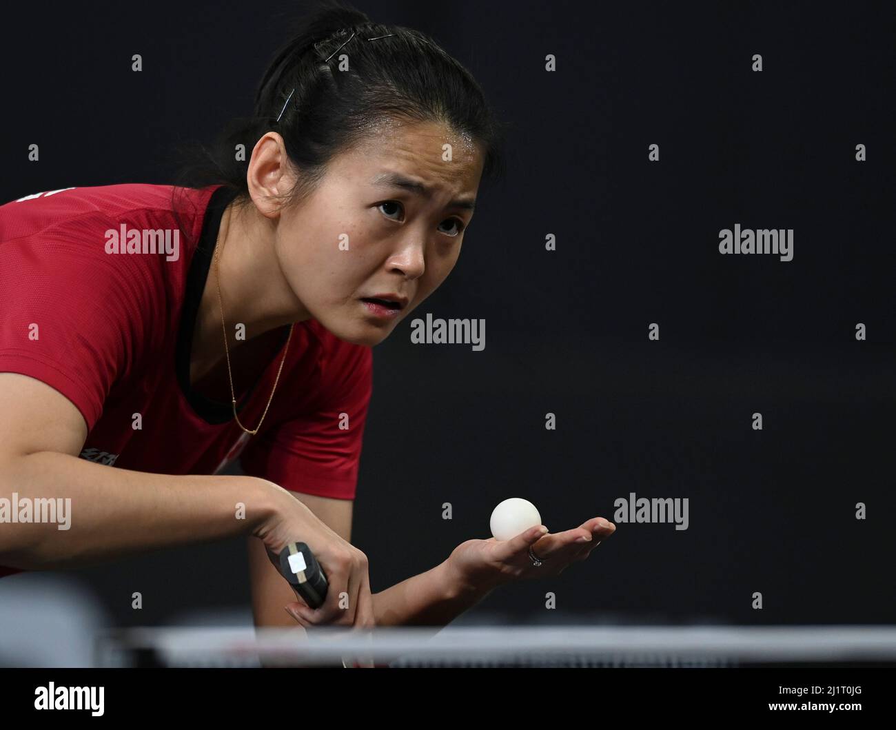 Doha, Qatar. 27th Mar, 2022. Zhang Mo of Canada serves during the women's singles round of 64 ...