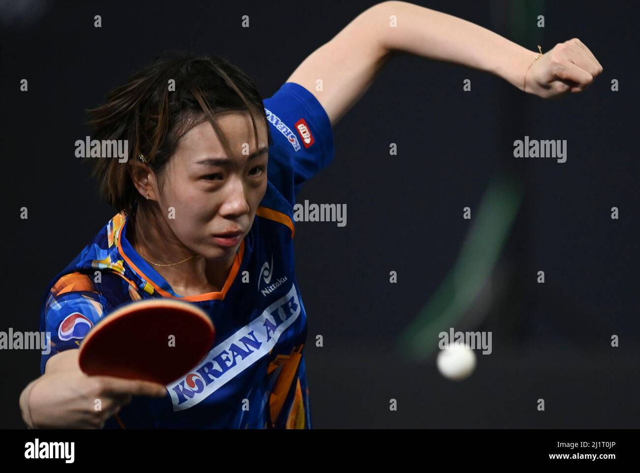 Doha, Qatar. 27th Mar, 2022. Kim Hayeong of South Korea hits a return during the women's singles ...