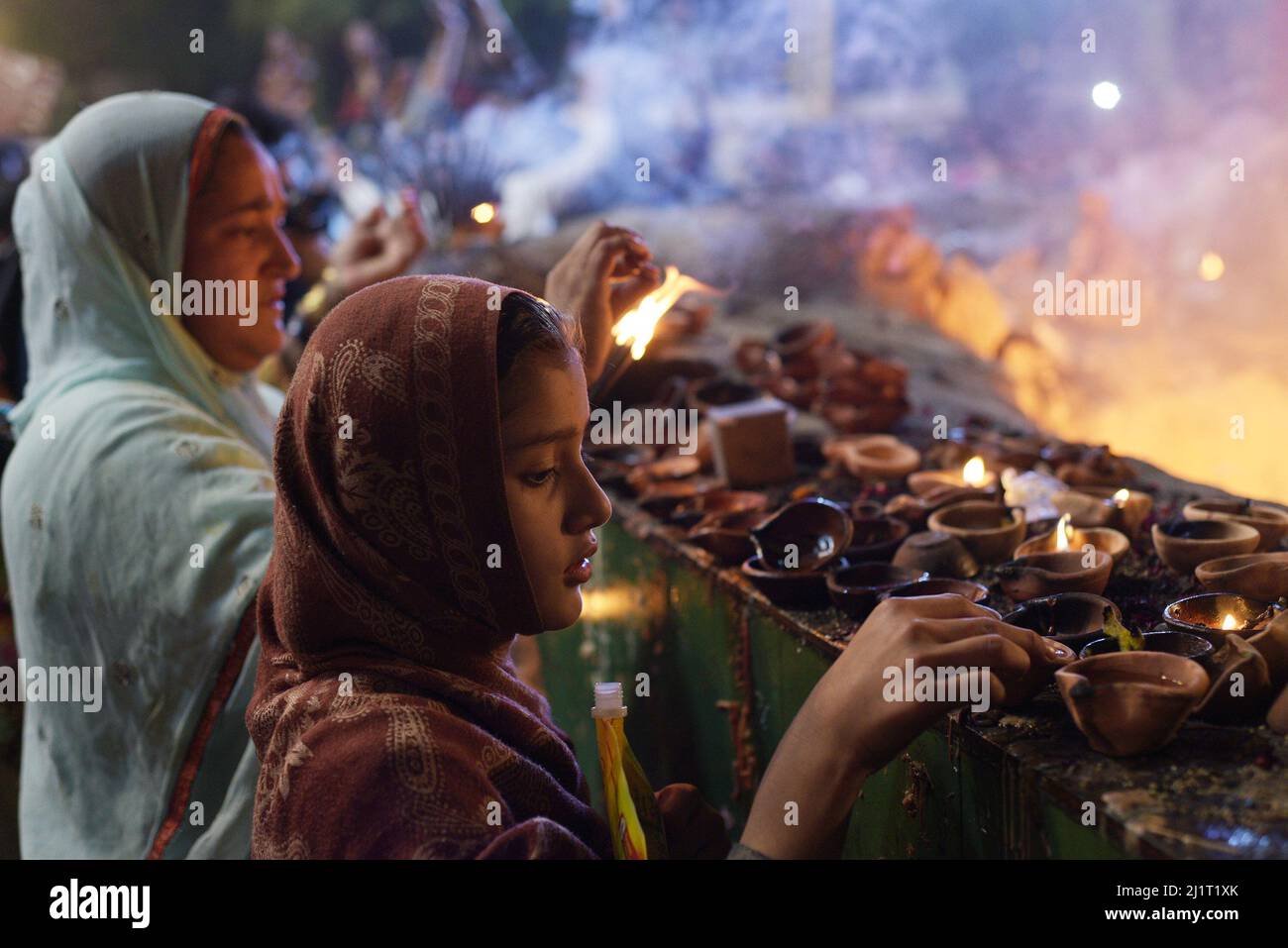 Pakistani devotees attend the three-days 434th annual Urs 'Festival of lights' at the shrine of ...
