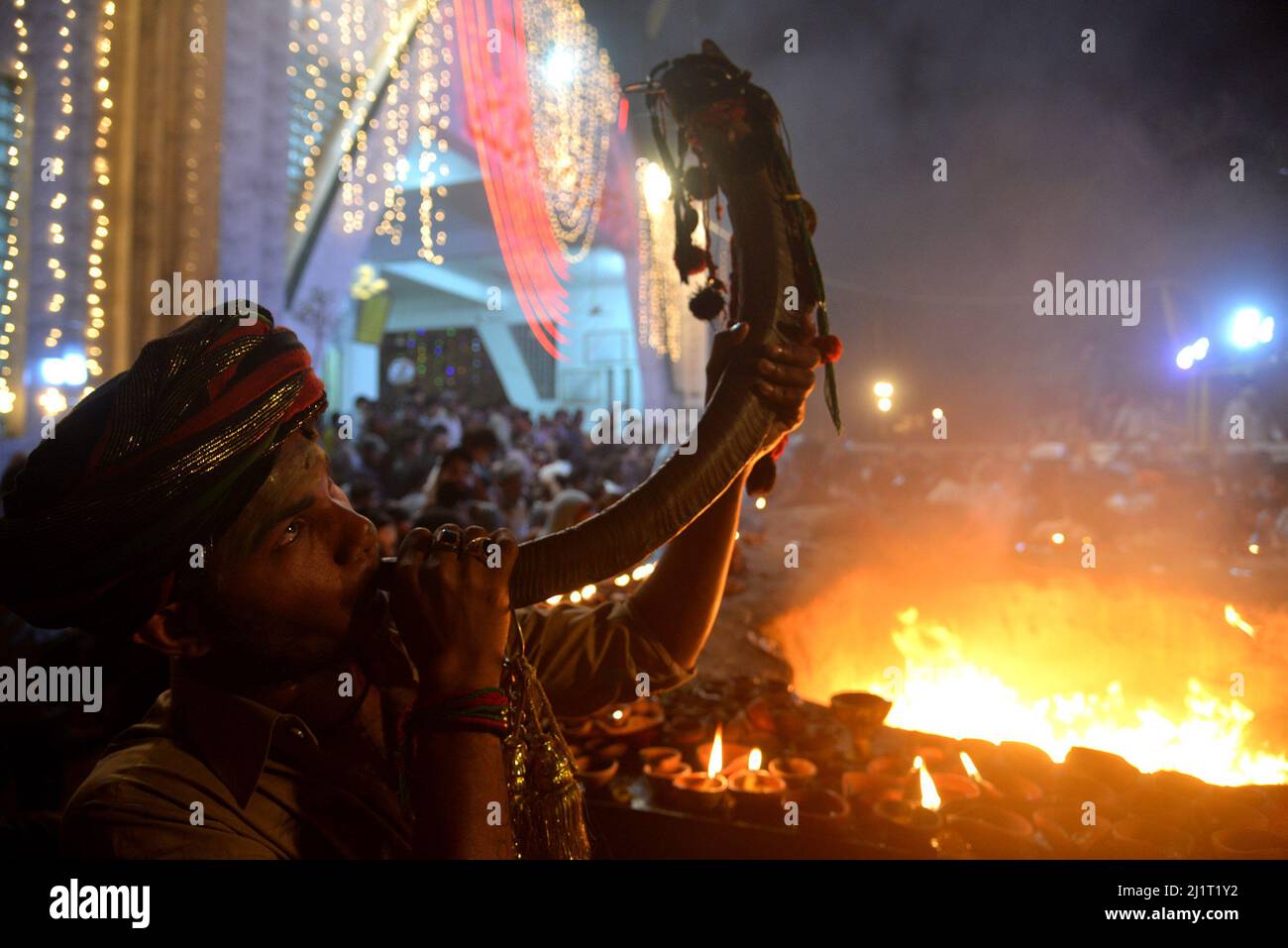 Pakistani devotees attend the three-days 434th annual Urs 'Festival of lights' at the shrine of ...