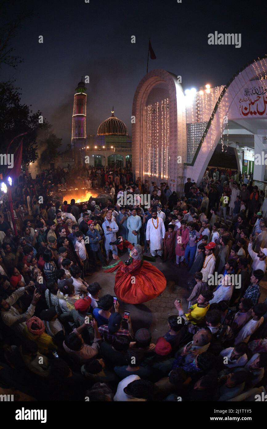 Pakistani devotees attend the three-days 434th annual Urs 'Festival of lights' at the shrine of ...
