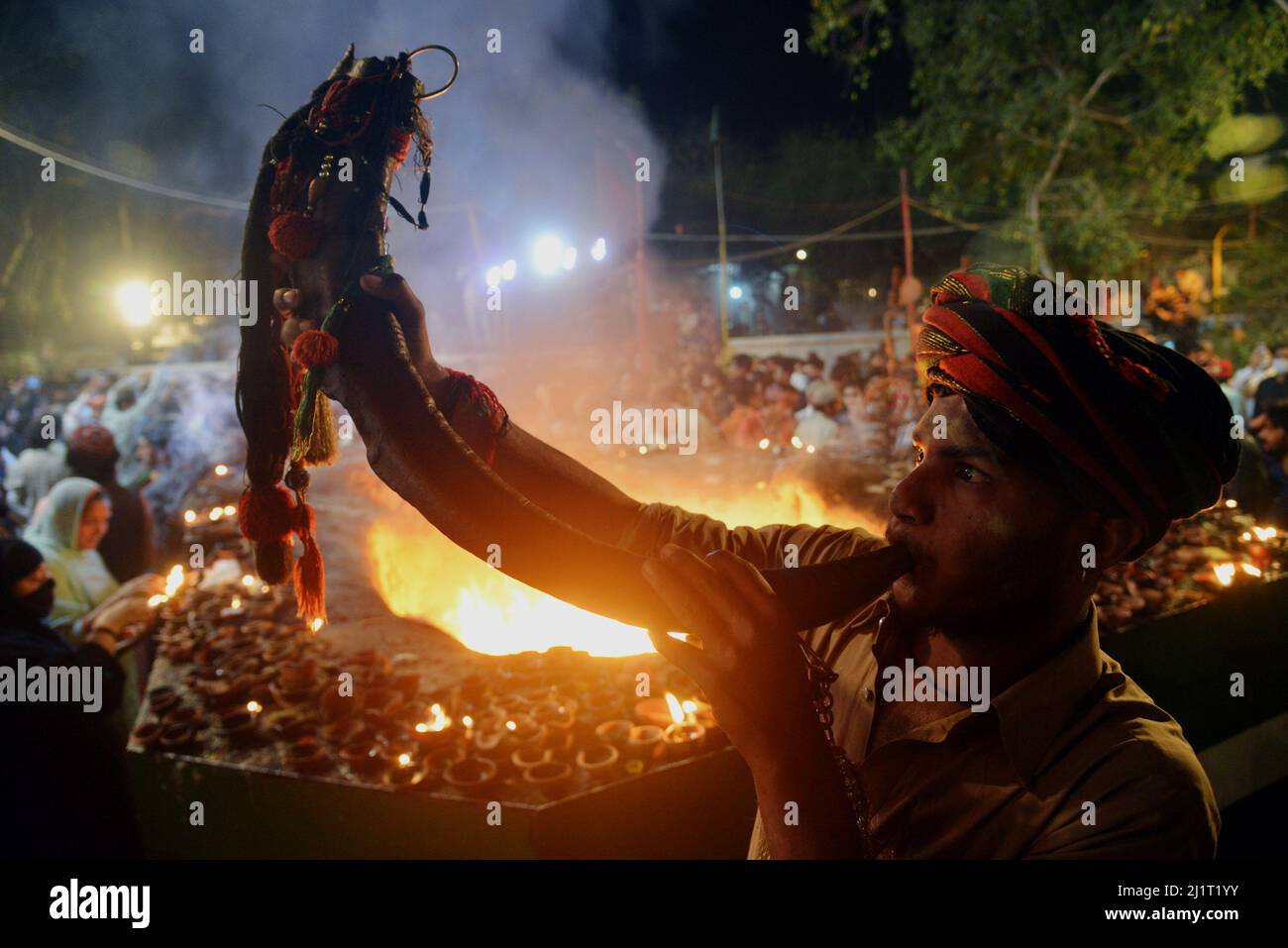 Pakistani devotees attend the three-days 434th annual Urs 'Festival of lights' at the shrine of ...