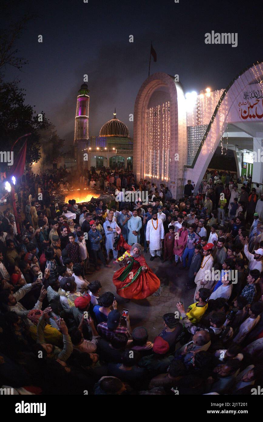 Pakistani devotees attend the three-days 434th annual Urs 'Festival of lights' at the shrine of ...