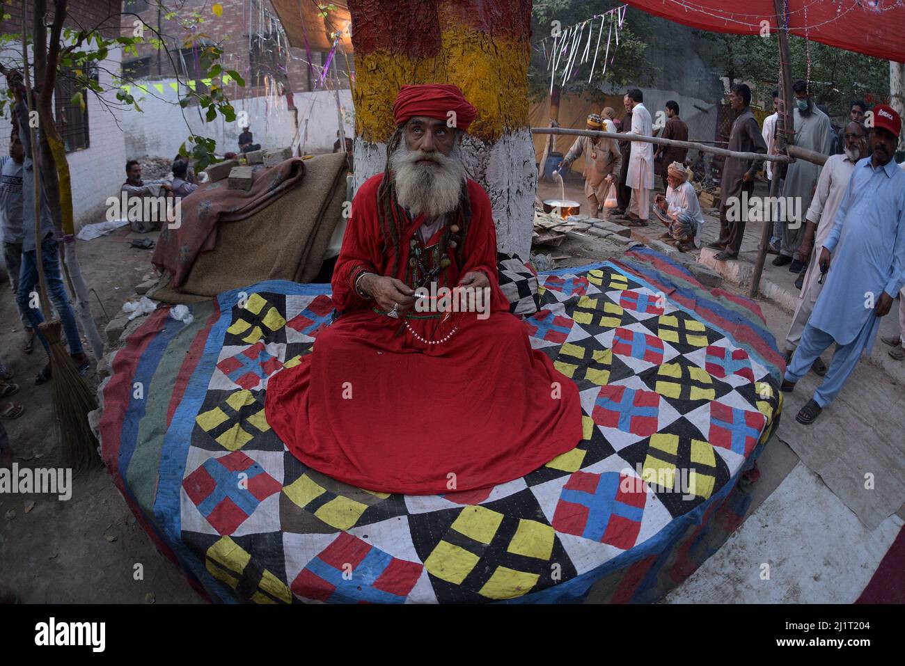Pakistani devotees attend the three-days 434th annual Urs 'Festival of lights' at the shrine of ...