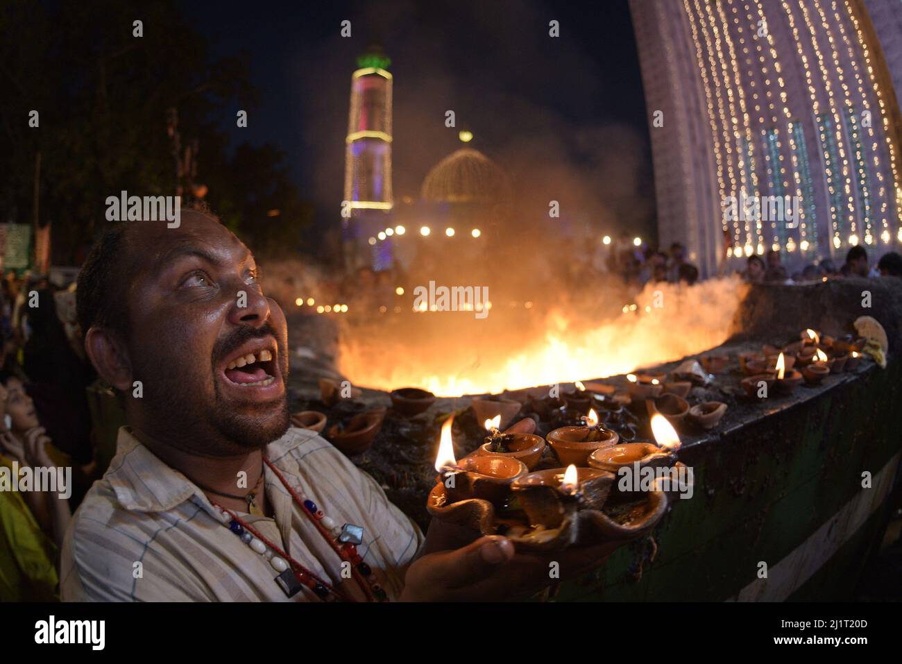 Pakistani devotees attend the three-days 434th annual Urs 'Festival of lights' at the shrine of ...