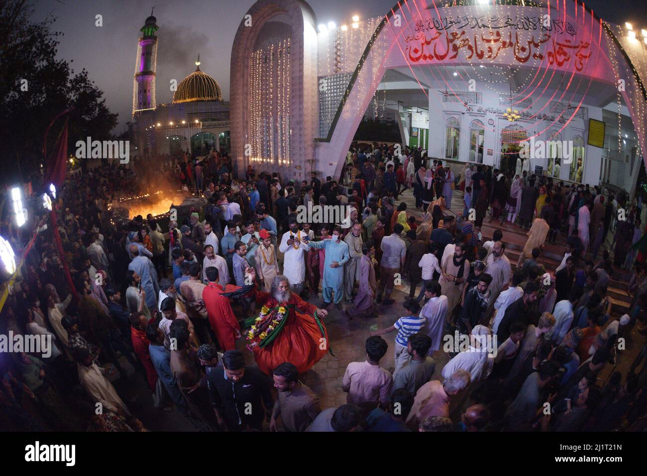Pakistani devotees attend the three-days 434th annual Urs 'Festival of lights' at the shrine of ...