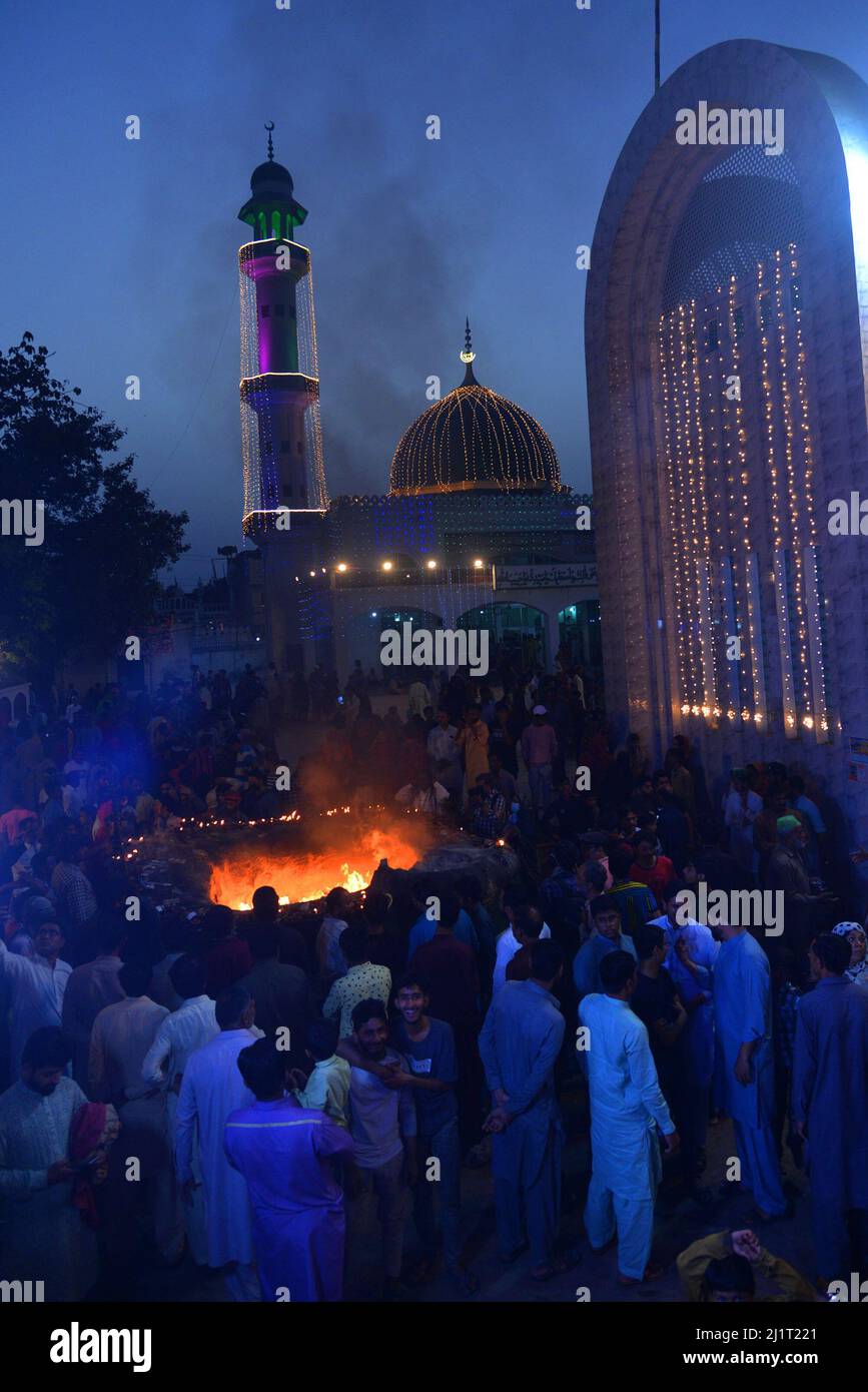 Pakistani devotees attend the three-days 434th annual Urs 'Festival of lights' at the shrine of ...