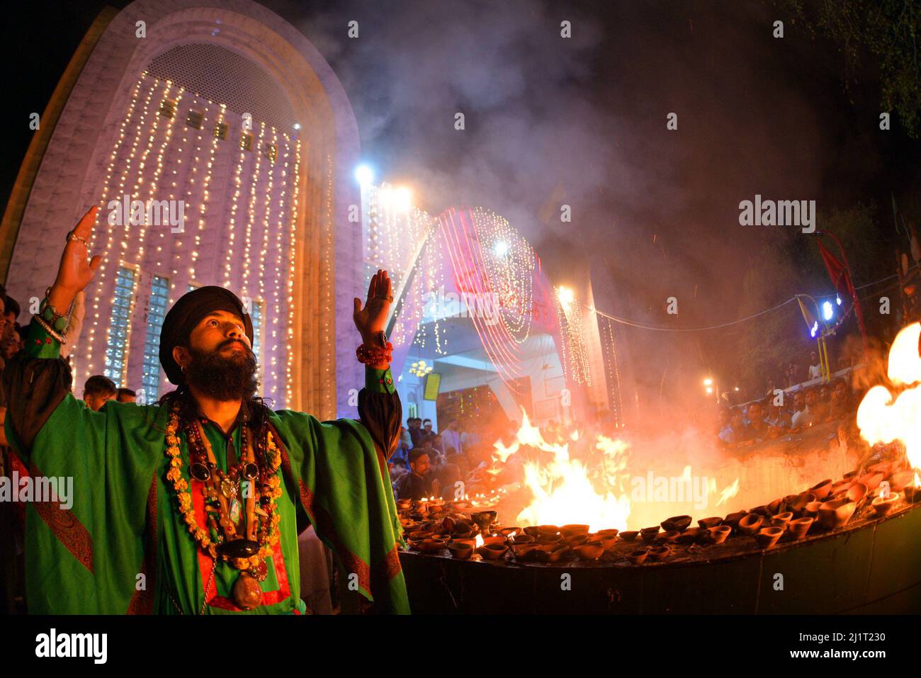 Pakistani devotees attend the three-days 434th annual Urs 'Festival of lights' at the shrine of ...
