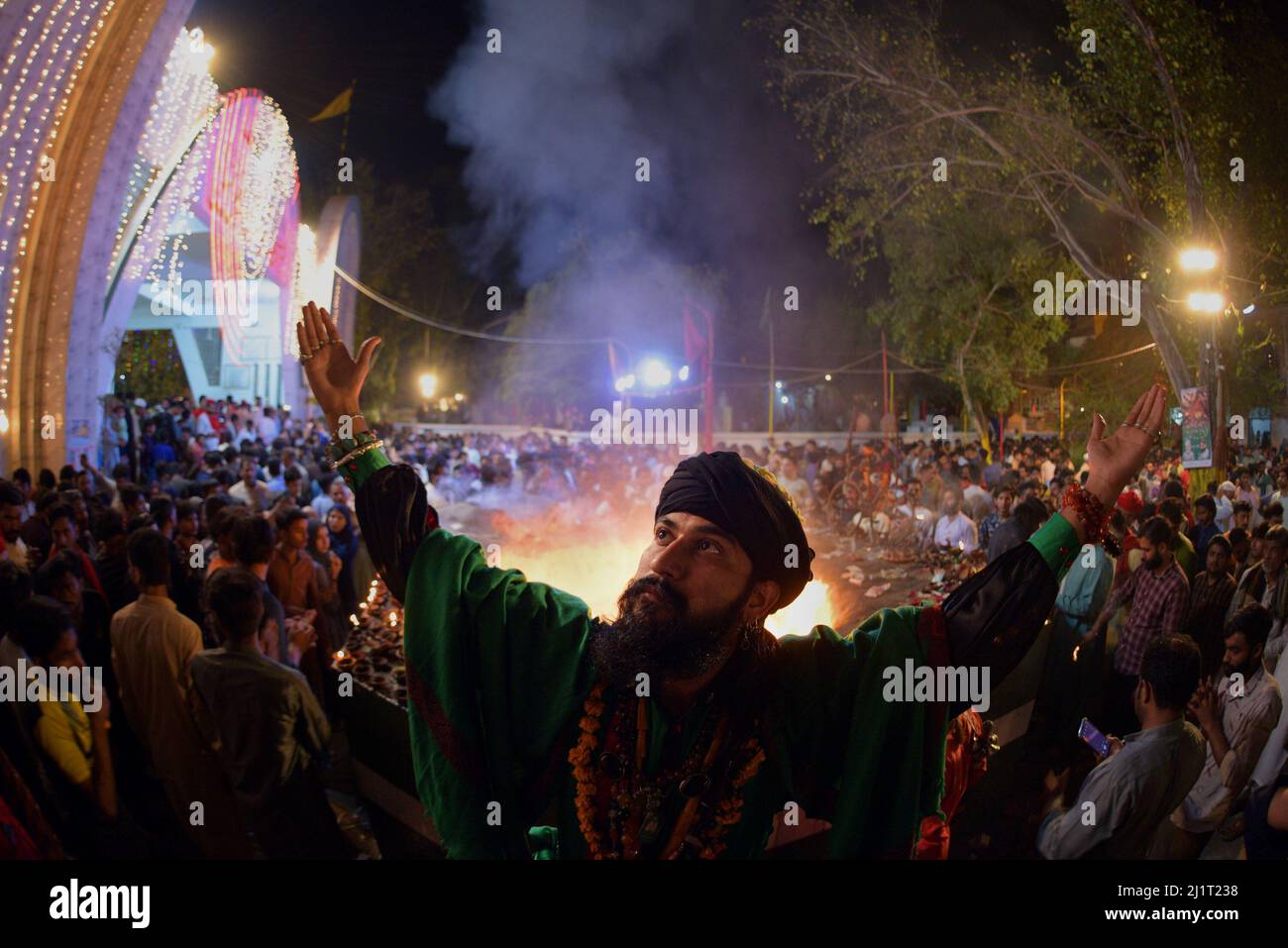 Pakistani devotees attend the three-days 434th annual Urs 'Festival of lights' at the shrine of ...