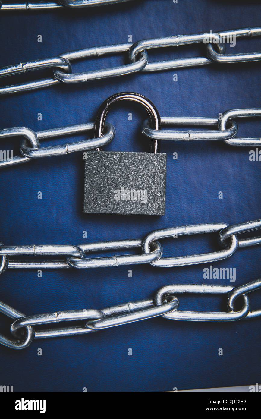 The book is locked under lock and key on a white background. Secret ...