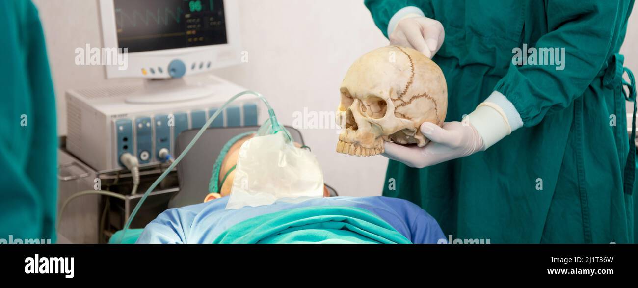 Team of doctor and surgeon explain about surgery skull and brain with ...