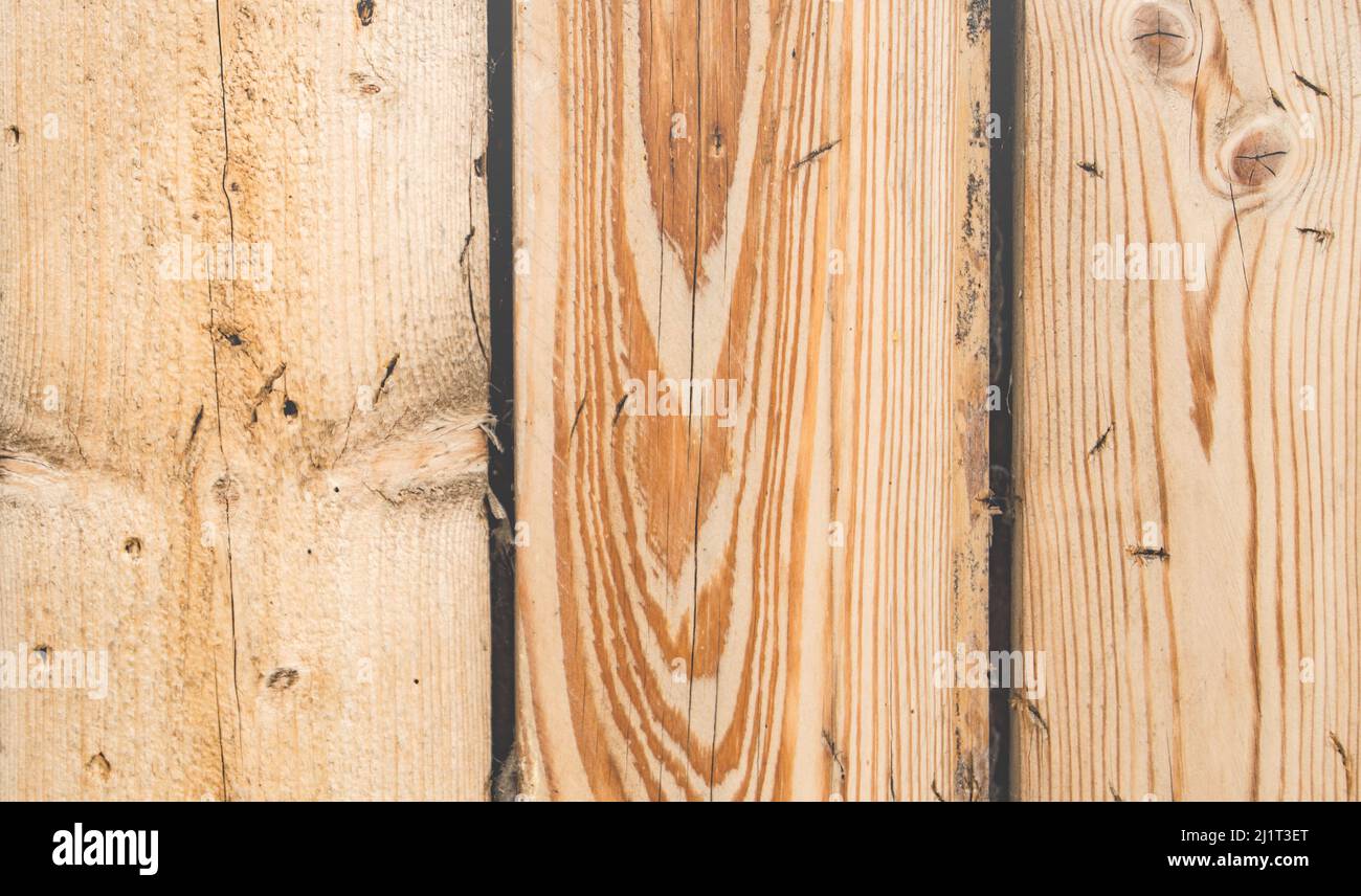 New planed boards, wood texture with cracks and knots, wooden ...