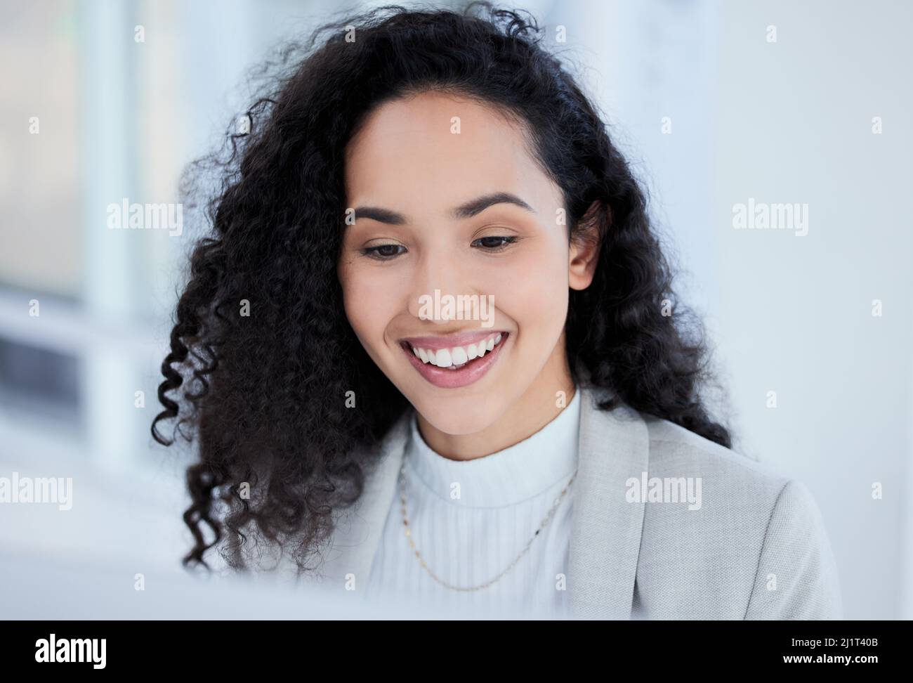 Curly brunette employee works in hi-res stock photography and images ...