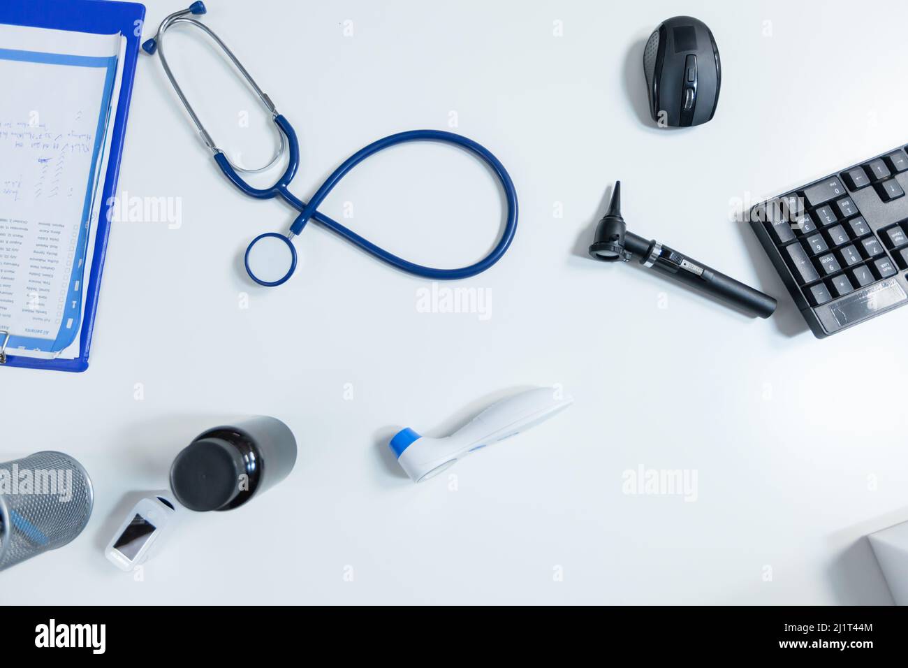 Top view of medical examination tools standing on table in empty modern ...