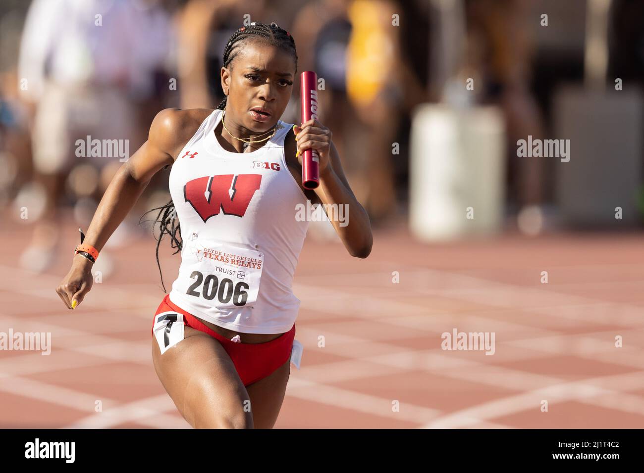 Wisconsin’s Kiley Robbins runs the anchor leg of the 4 x 100 relay ...