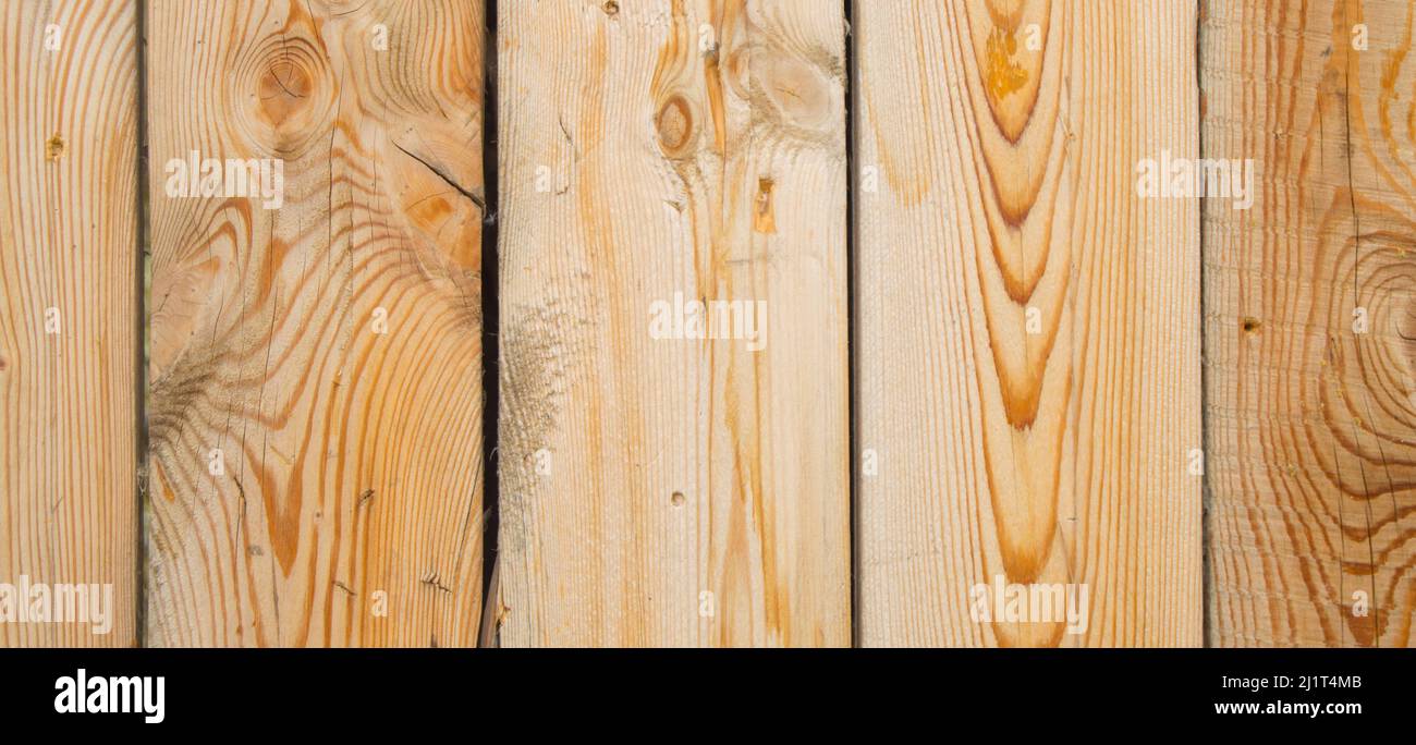 New planed boards, wood texture with cracks and knots, wooden ...