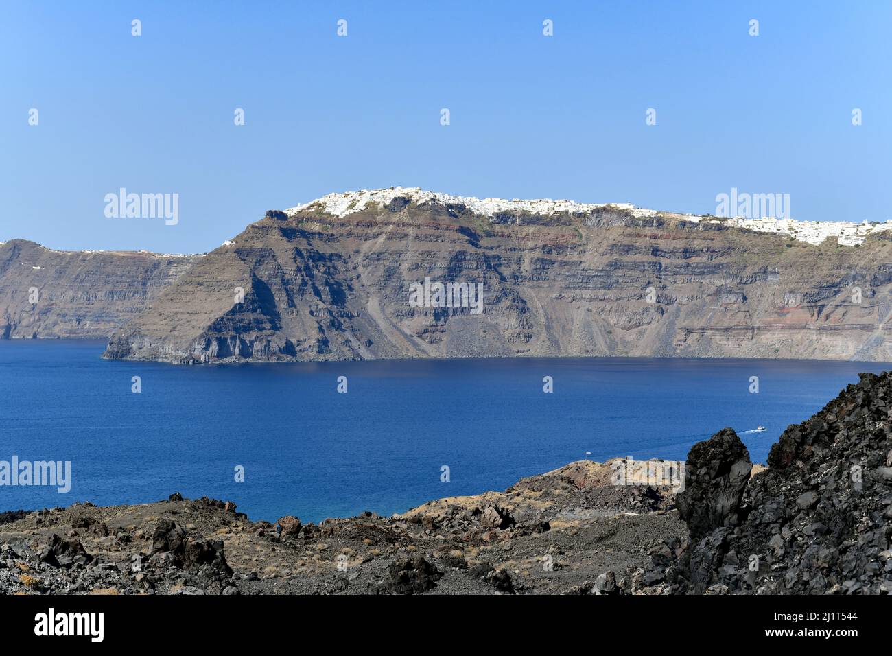 View of the island of Nea Kameni the volcano in the caldera of ...