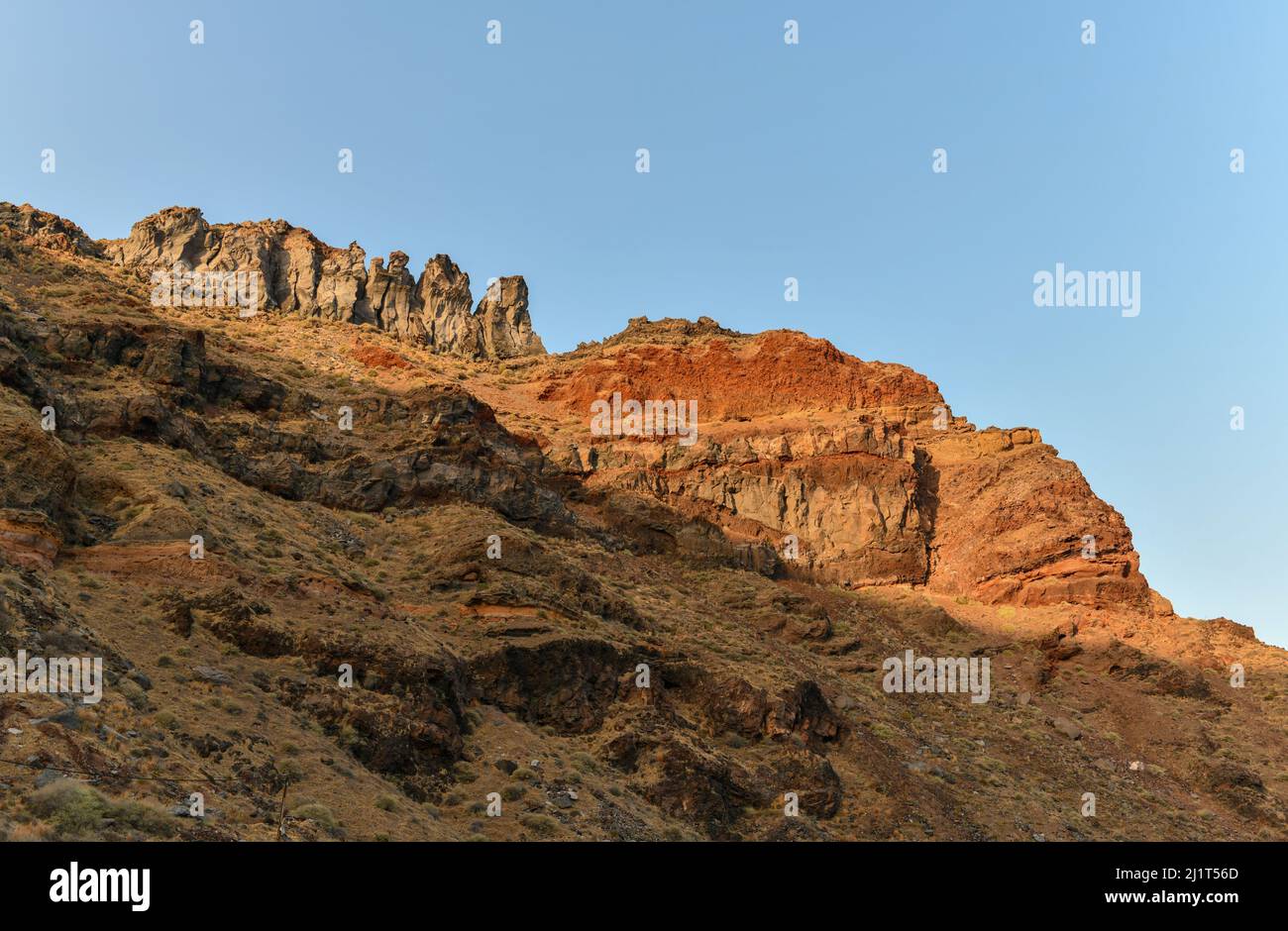 View of the cliffs of Thirasia in the caldera of Santorini, Cyclades ...