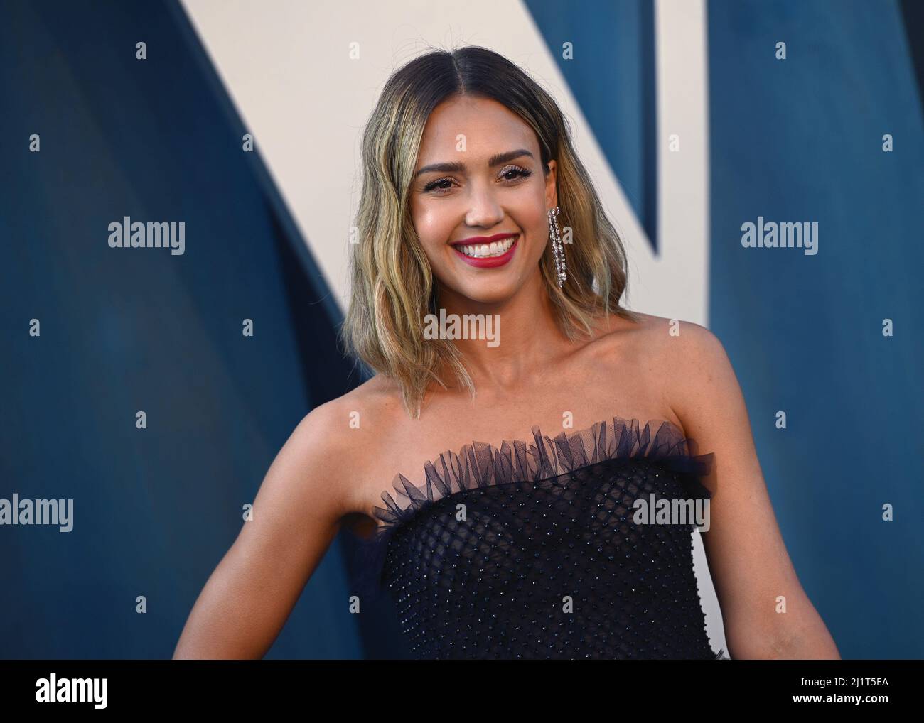 Jessica Alba on the red carpet at the 2022 Vanity Fair Oscar Party held ...