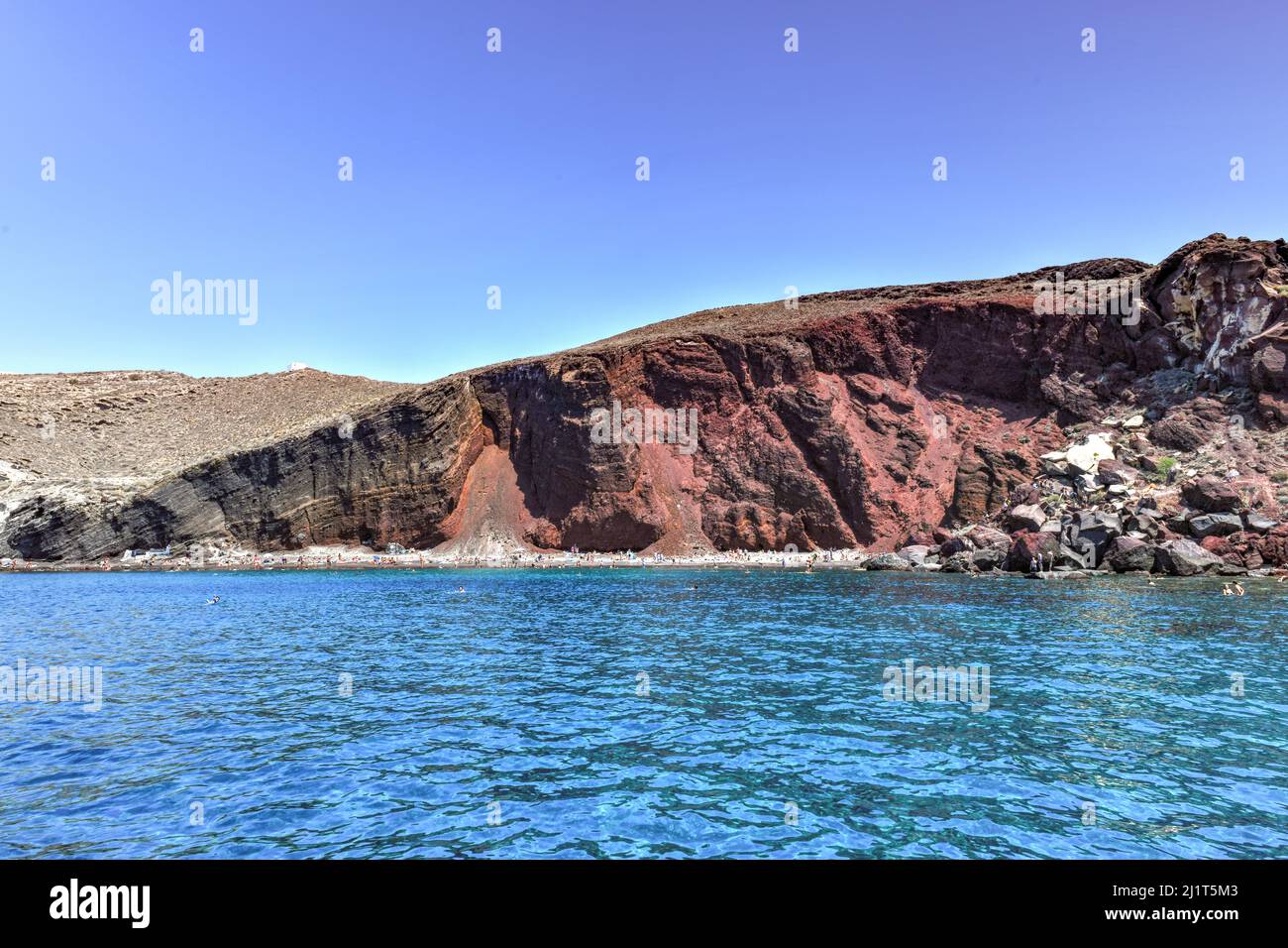 The famous Red Beach in Santorini, Greece with a blue sky Stock Photo ...