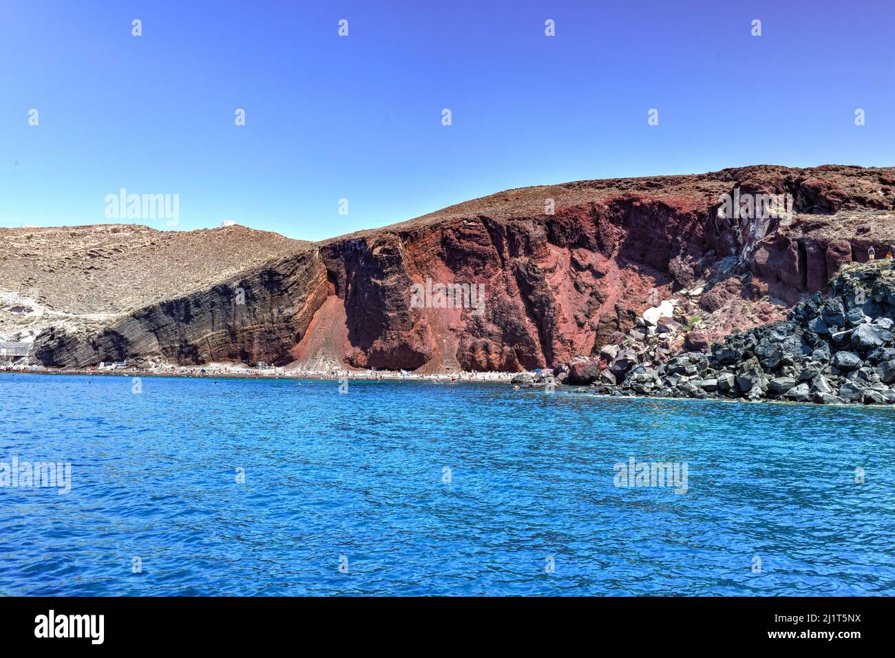The famous Red Beach in Santorini, Greece with a blue sky Stock Photo ...