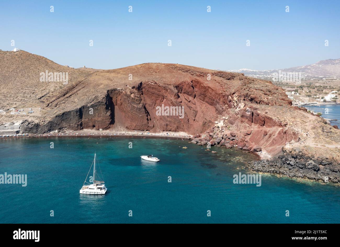 The famous Red Beach in Santorini, Greece with a blue sky Stock Photo ...
