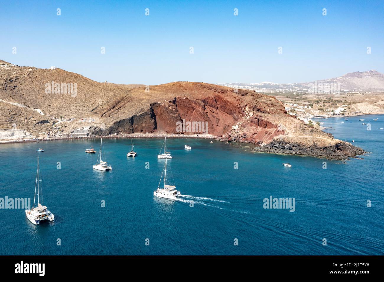 The famous Red Beach in Santorini, Greece with a blue sky Stock Photo ...