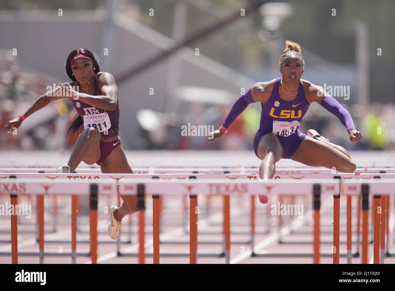 Alia Armstrong of LSU and Kaylah Robinson of Texas A&M place first and ...