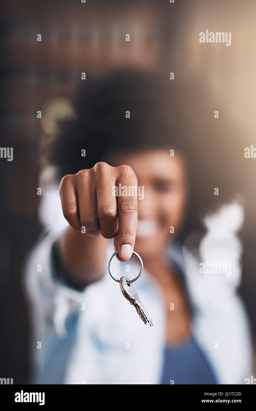 Woman holding house keys hi-res stock photography and images - Alamy