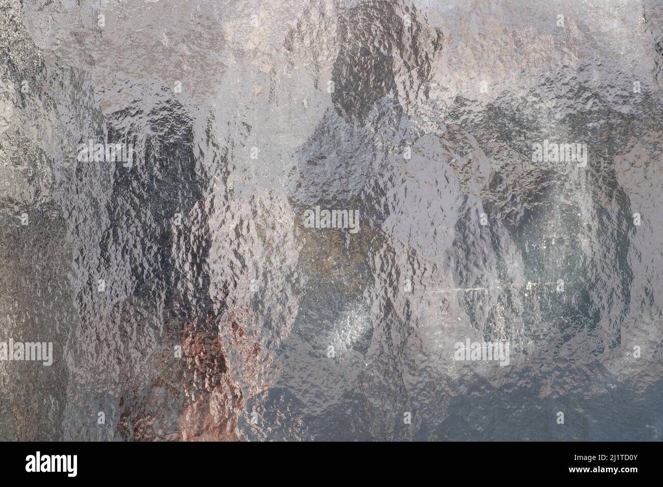 detail of soft pattern of a structured glass as harmonic background ...