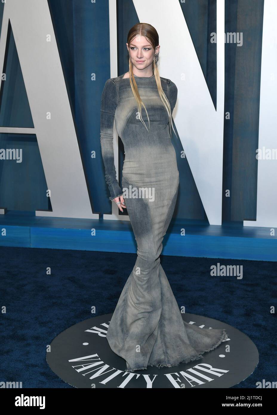 Hunter Schafer walking on the red carpet at the 2022 Vanity Fair Oscar ...