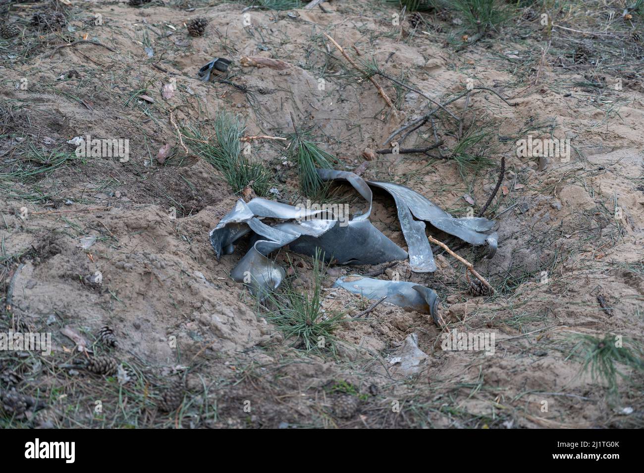 Remains of the Grad multiple rocket launcher in the crater. Consequence ...