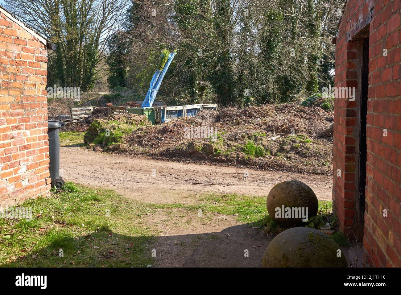 Farm yard track scene Stock Photo - Alamy