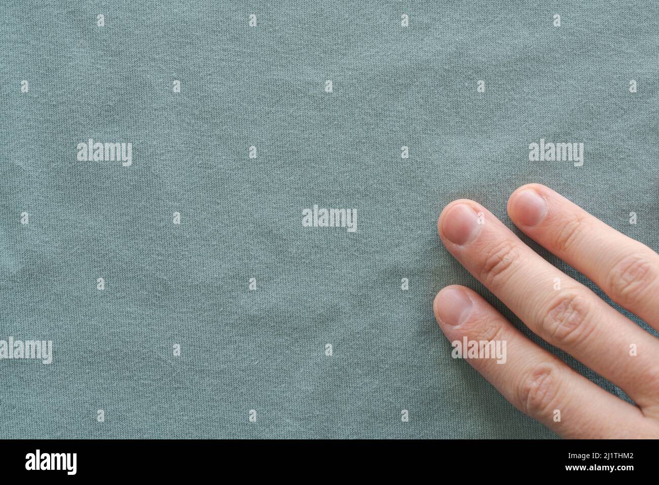 Hand touch fabric hi-res stock photography and images - Alamy