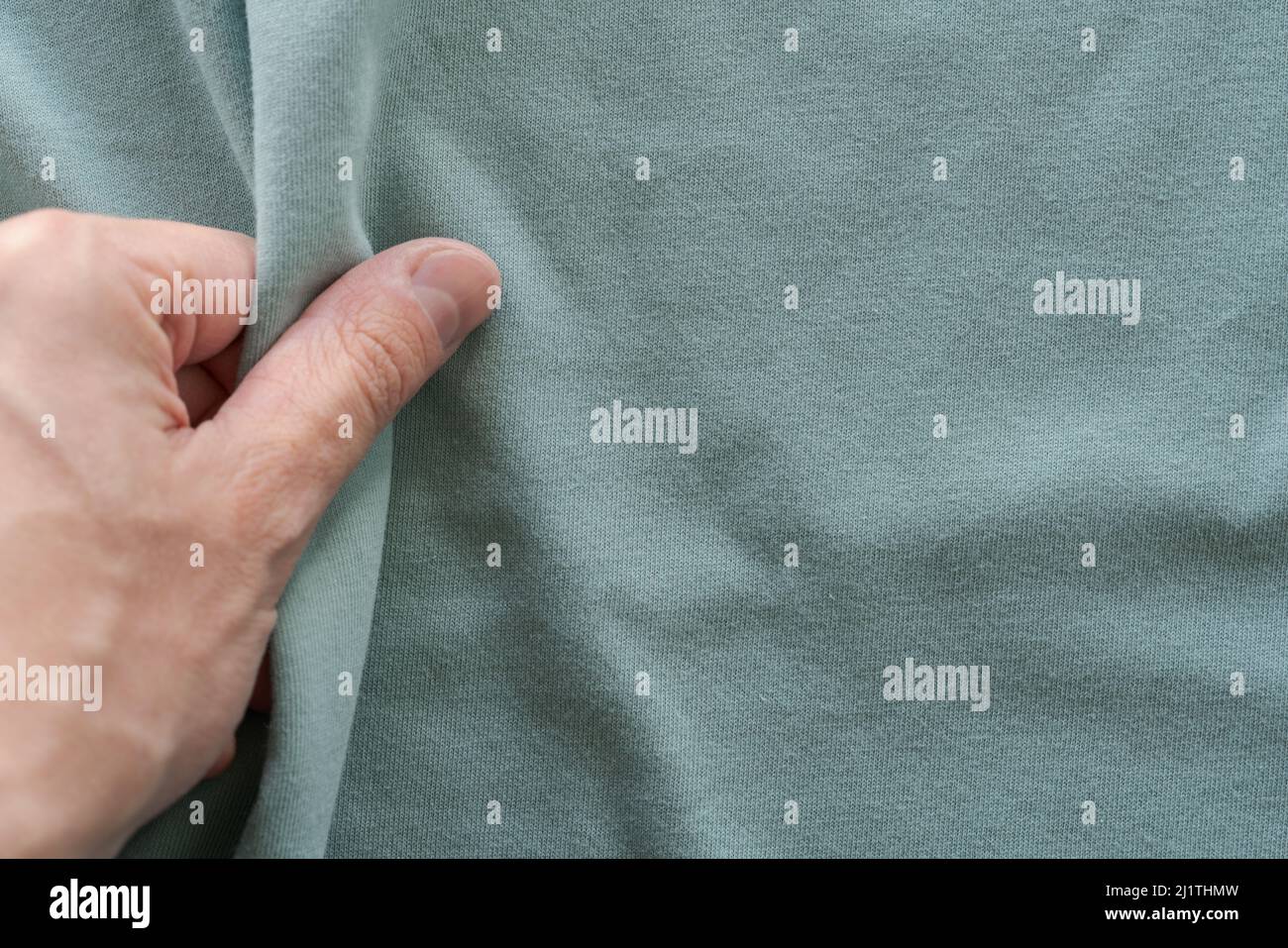 Hand touch fabric hi-res stock photography and images - Alamy
