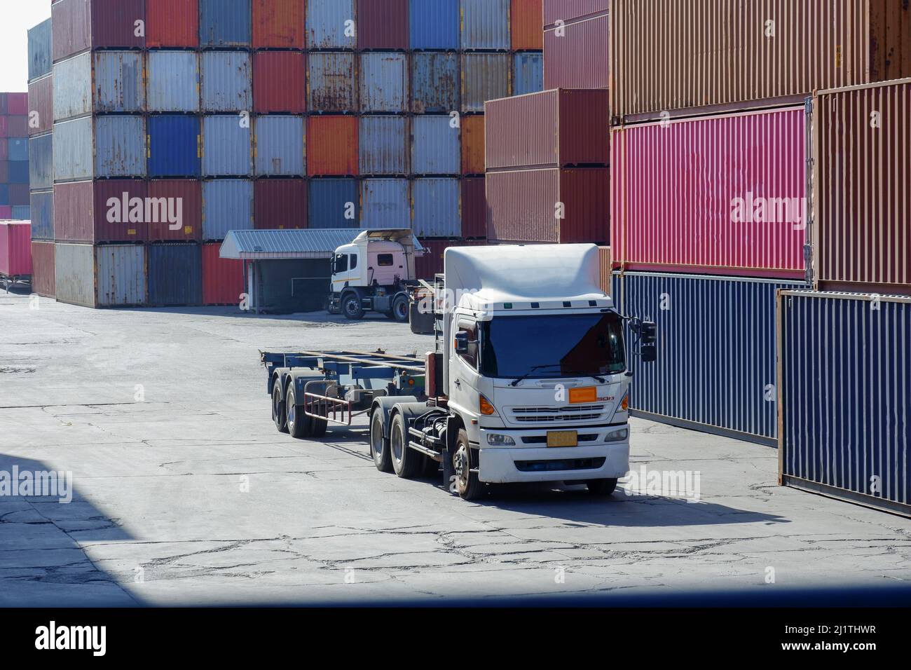 Image of a truck in a container yard Stock Photo - Alamy