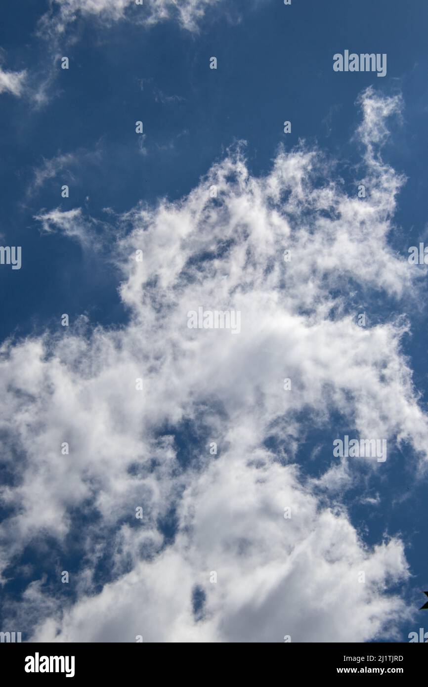 The shape of a go-go dancer in the clouds Stock Photo - Alamy