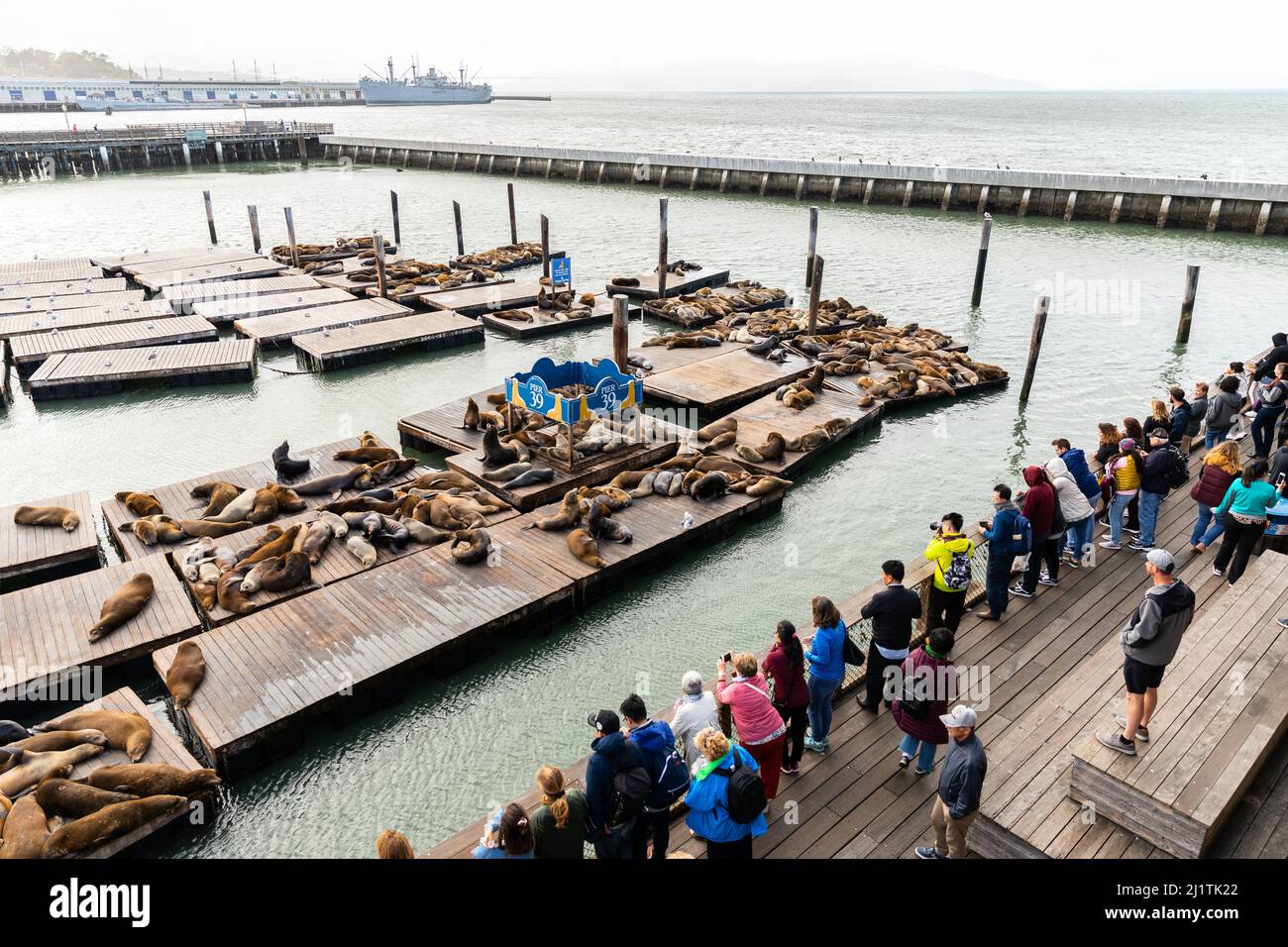 San Francisco, California, USA - September 28, 2019: Tourists at wooden ...