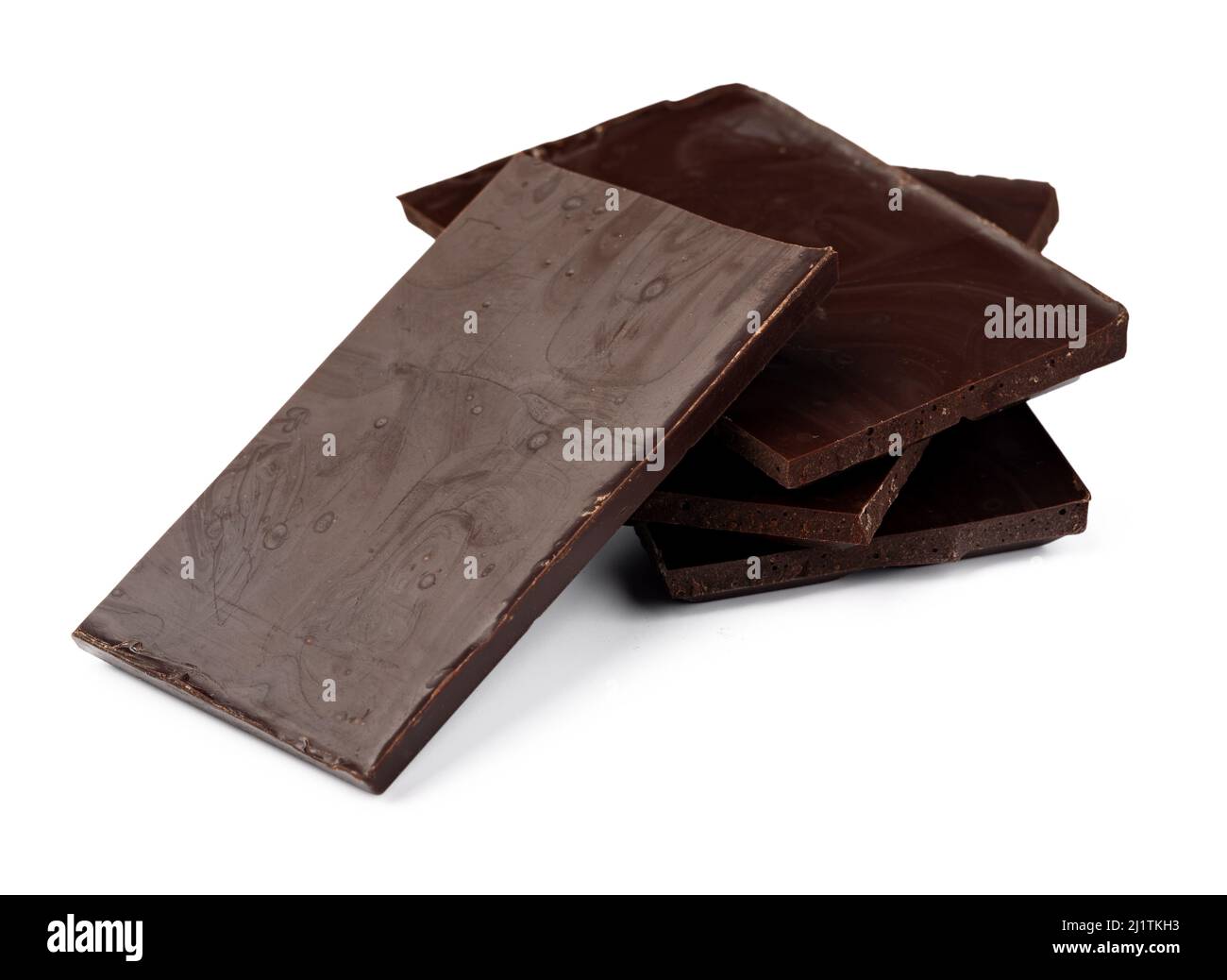 Small dark chocolate pieces isolated on white background Stock Photo ...
