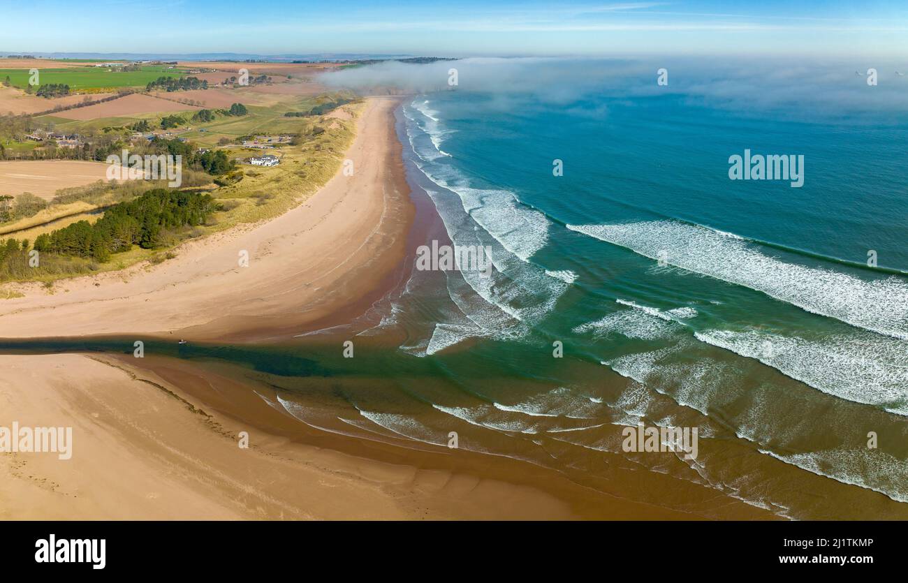 Aerial view from drone of Lunan Beach at Lunan Bay on coast of Angus in ...