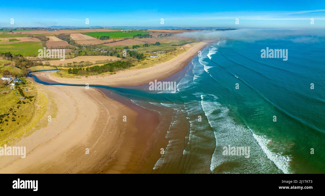 Aerial view from drone of Lunan Beach at Lunan Bay on coast of Angus in ...