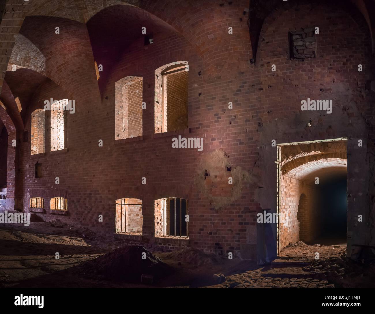 abandoned underground brick fort rooms illuminated by counter light ...