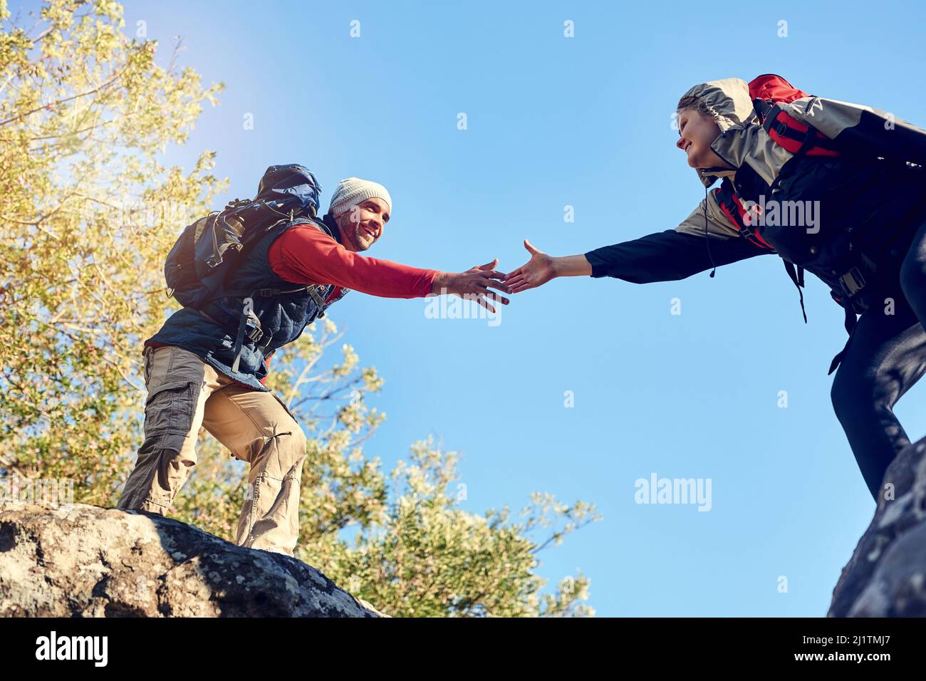 Helping hands mountain climbing hi-res stock photography and images - Alamy