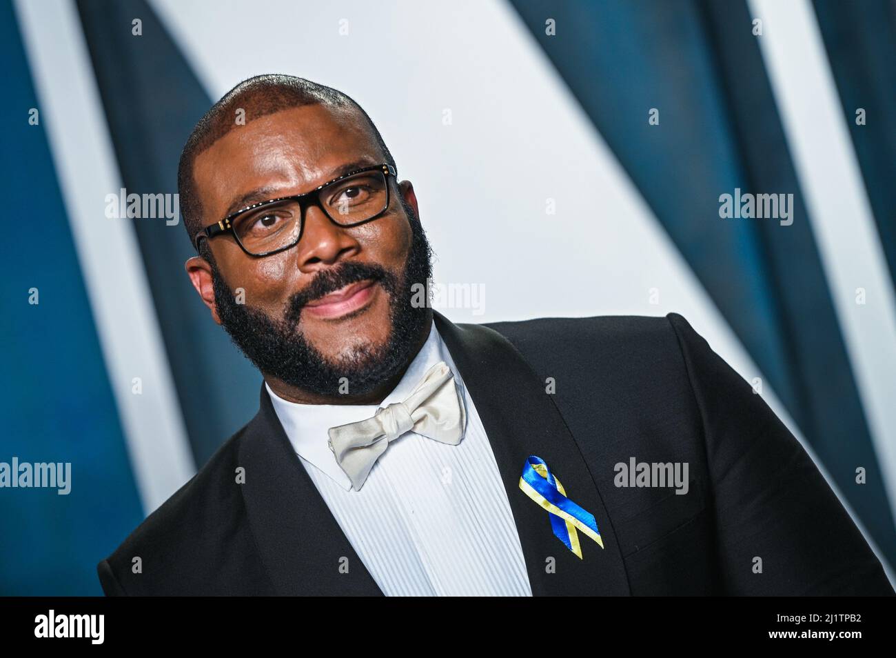 Tyler Perry walking on the red carpet at the 2022 Vanity Fair Oscar ...