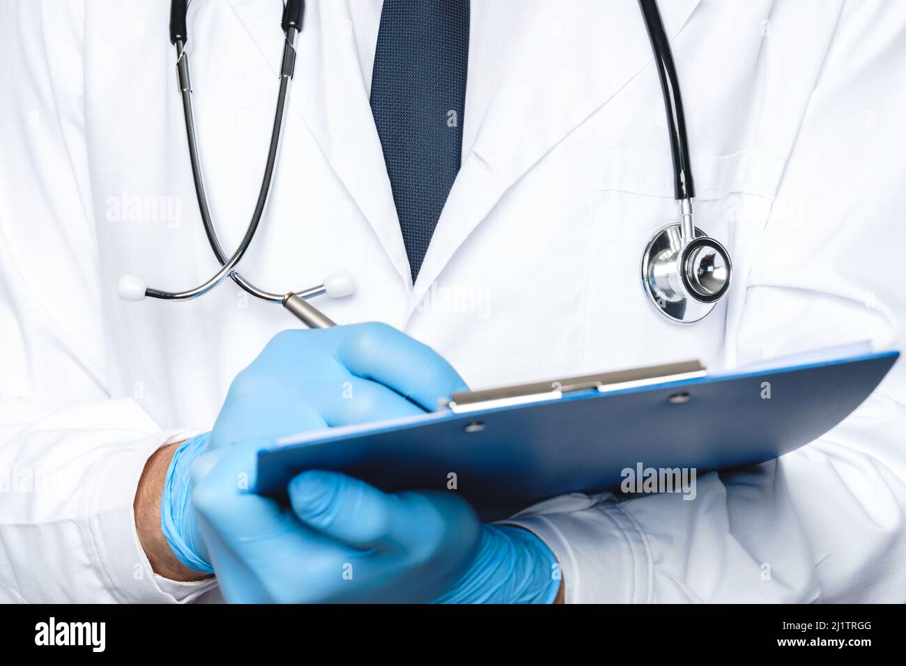 Male doctor writing notes hospital hi-res stock photography and images ...