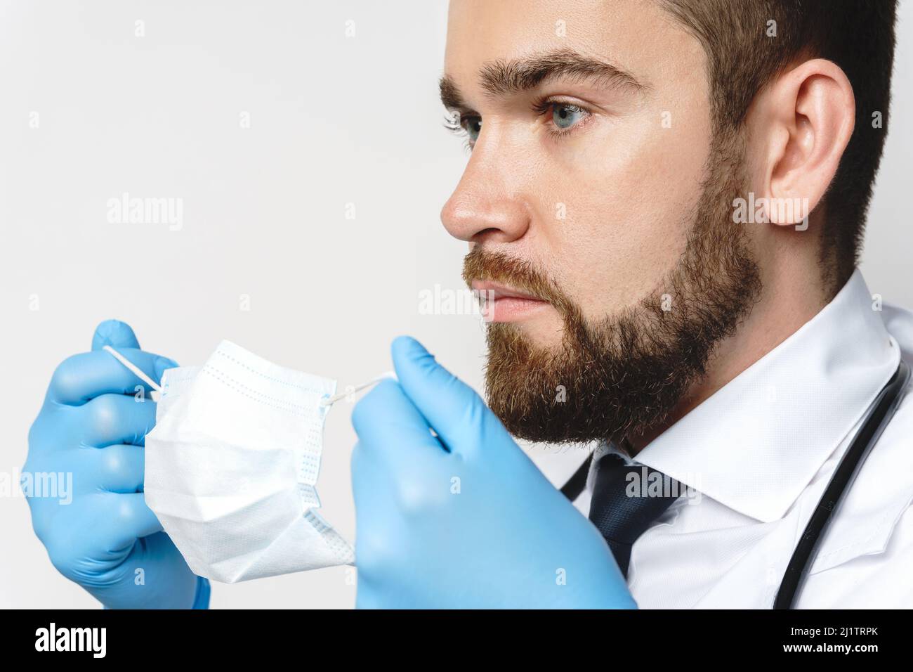 Doctor is wearing prevention mask against virus spreading Stock Photo ...