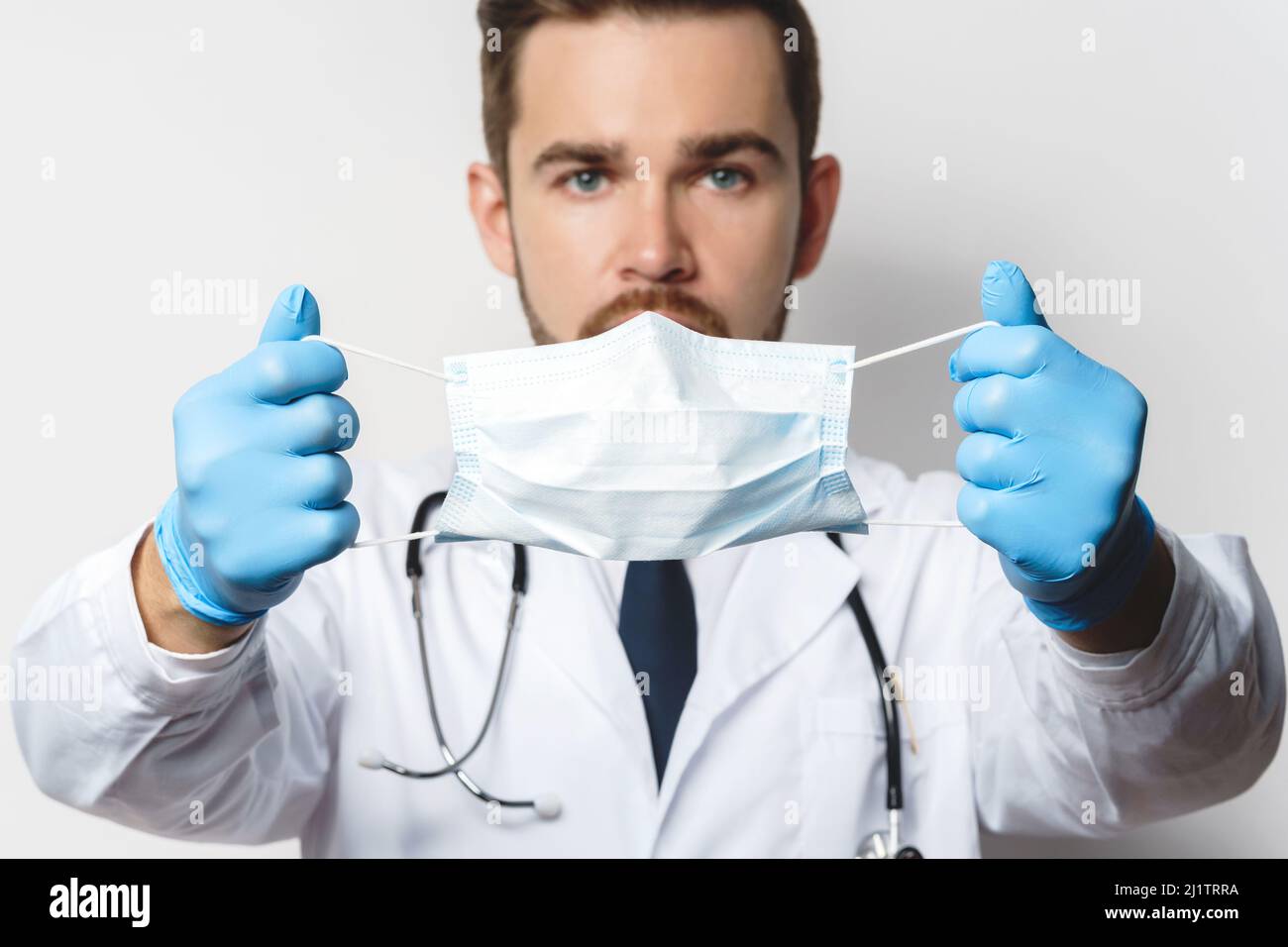 Doctor is wearing prevention mask against virus spreading Stock Photo ...